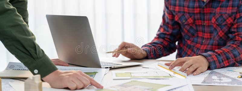 Professional Architect Design a Blueprint by Using Laptop. Closeup ...