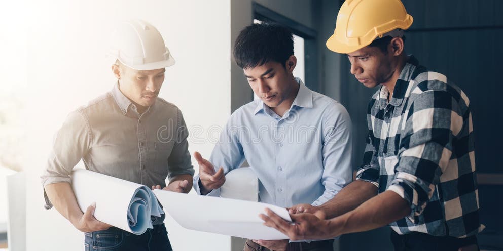 Professional Architect Designer Structural Engineer Team Colleagues Discussing Building Plan ...