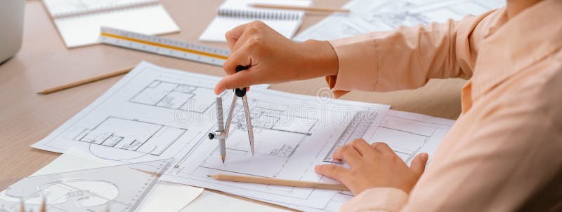 Professional Architect Drawing Blueprint by Using Divider. Closeup ...