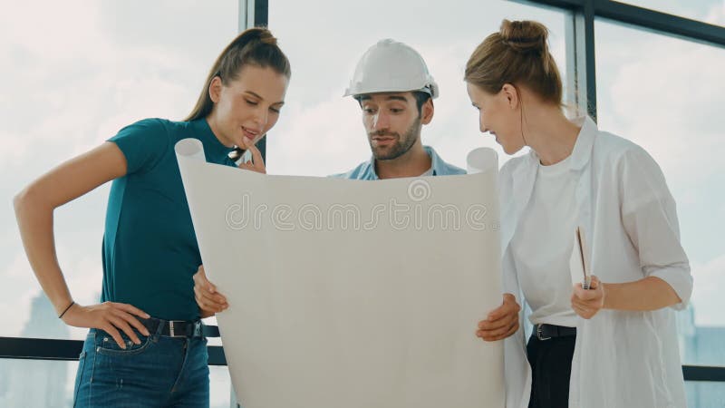 Engineer Team Thinking about Design while Looking at Project Plan ...