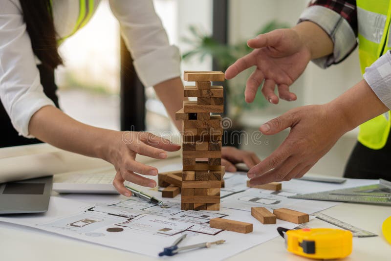 A Professional Architect with Engineering Objects in the Workplace with ...