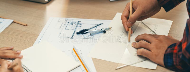 Professional Architect Hand Drawing a Blueprint on Table. Closeup ...