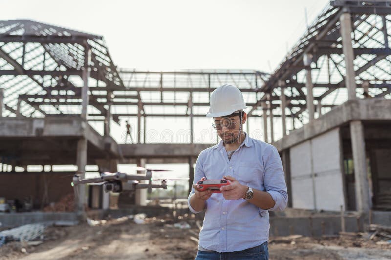 Professional Architect Operating Drone for Aerial View Survey ...