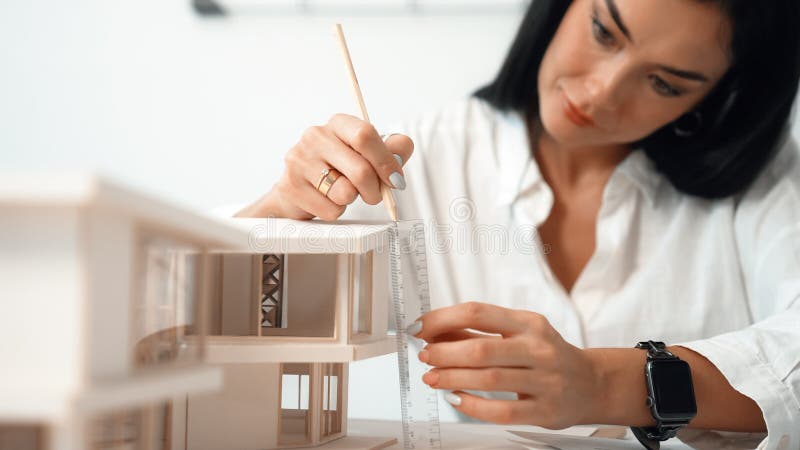 Professional Architect Using Triangular Scale Measure House Model ...