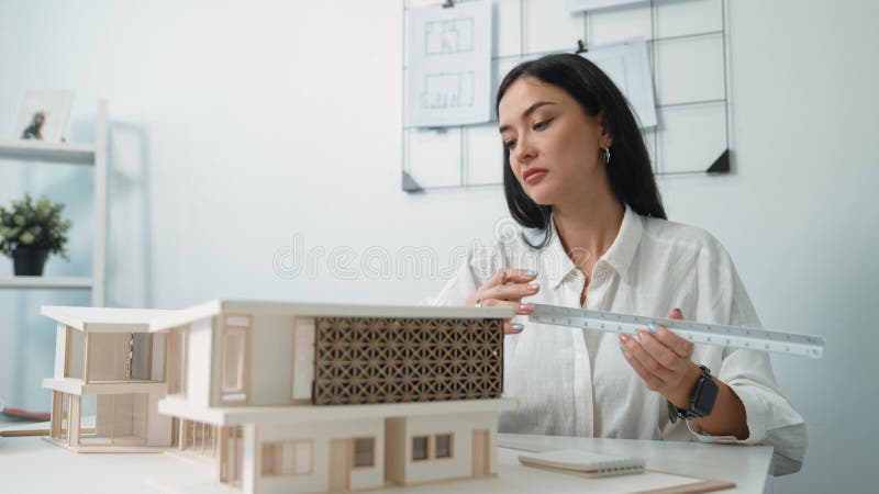 Professional Architect Using Triangular Scale Measure House Model ...