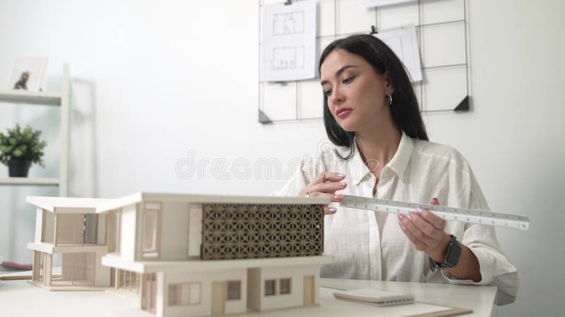 Professional Architect Using Triangular Scale Measure House Model ...