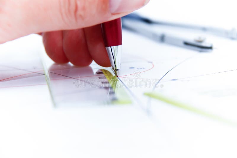 Professional Architect Working at His Desk, Measuring and Estimating ...