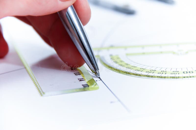 Professional Architect Working at His Desk, Measuring and Estimating ...