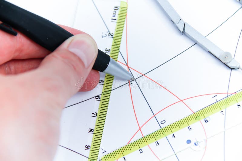 Professional Architect Working at His Desk, Measuring and Estimating ...