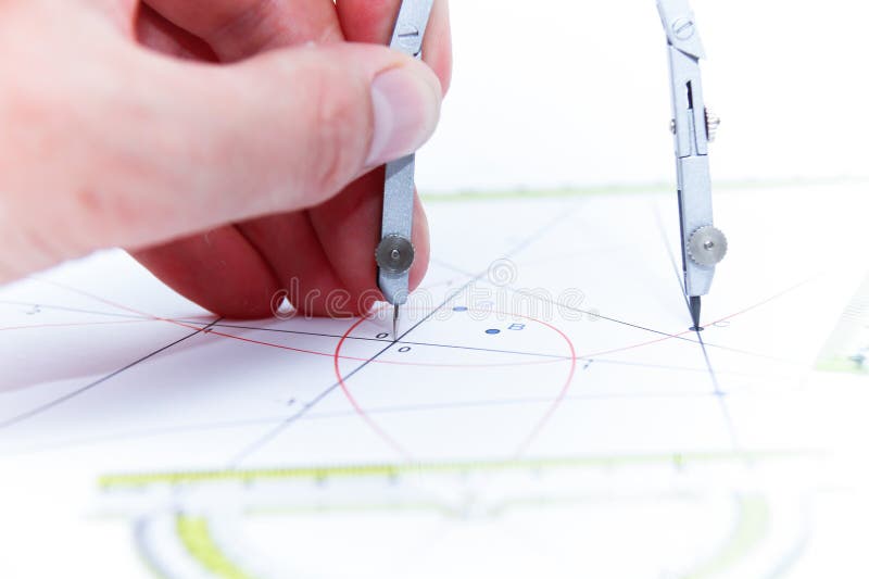 Professional Architect Working at His Desk, Measuring and Estimating ...