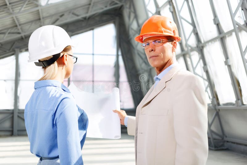 Professional Architects Discussing Project Stock Photo - Image of ...