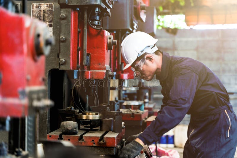 Professional Asian Worker Stand and Maintenance the Big Machine in the ...