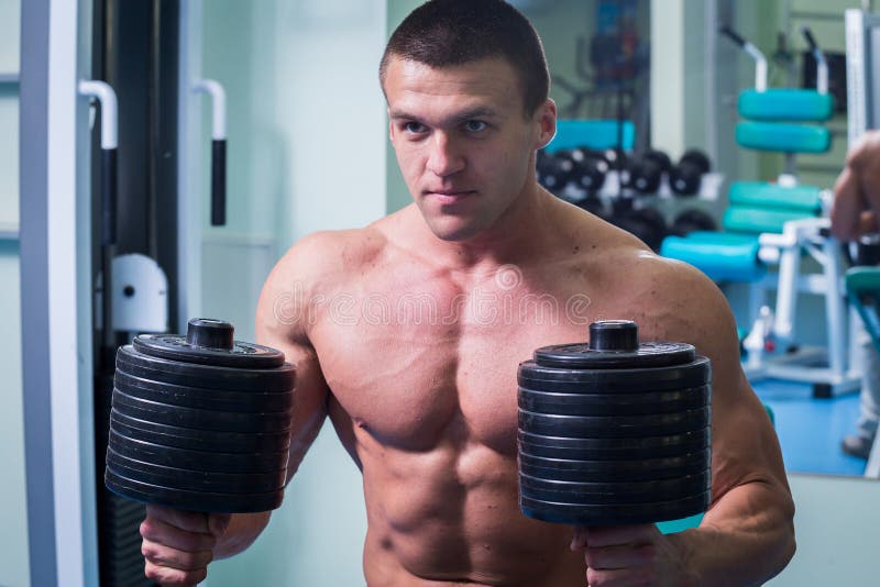 A Professional Athlete in the Gym Stock Image - Image of abdominal ...