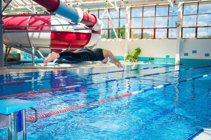Professional Athlete Jumps into the Water in the Pool Stock Photo ...