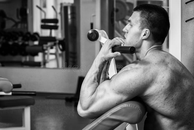Professional Athlete Performs Exercises in the Gym Stock Photo - Image ...