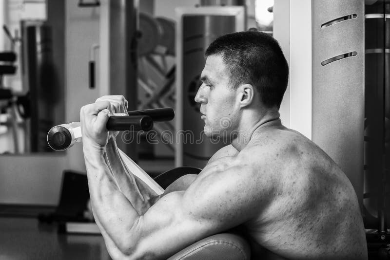 Professional Athlete Performs Exercises in the Gym Stock Image - Image ...