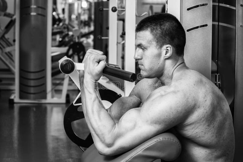 Professional Athlete Performs Exercises in the Gym Stock Image - Image ...