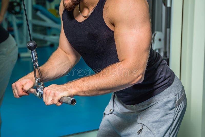 Professional Athlete Performs Exercises in the Gym Stock Photo - Image ...