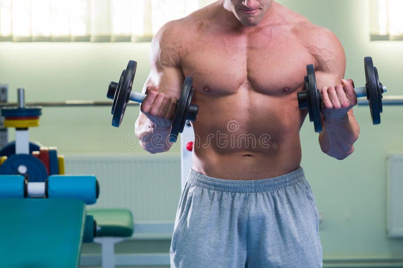 Professional Athlete Performs Exercises in the Gym Stock Photo - Image ...