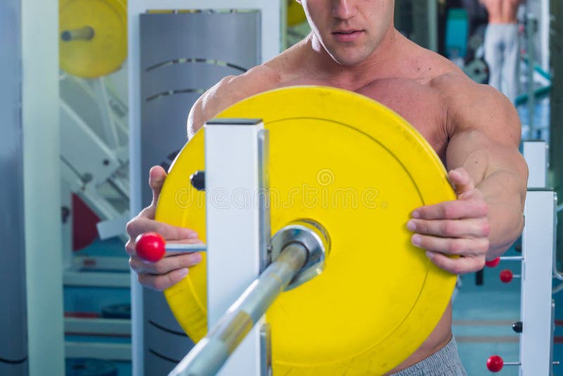 Professional Athlete Performs Exercises in the Gym Stock Image - Image ...
