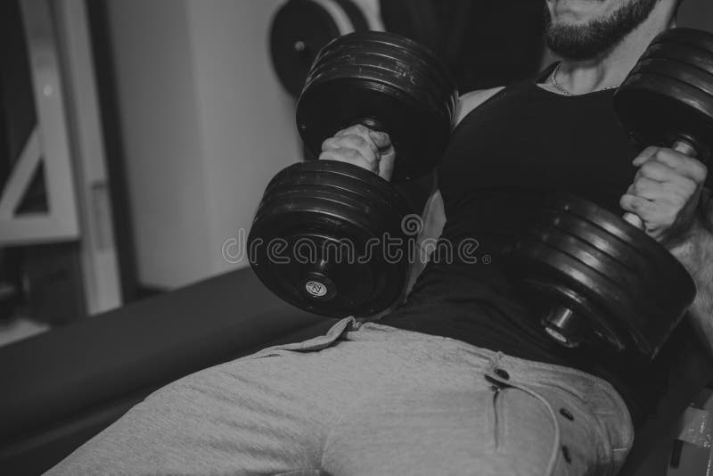 Professional Athlete Performs Exercises in the Gym Stock Image - Image ...