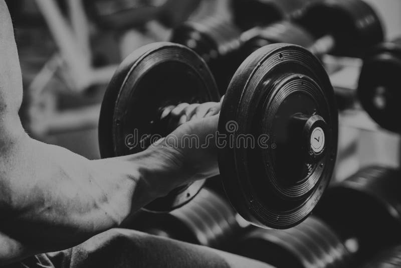 Professional Athlete Performs Exercises in the Gym Stock Photo - Image ...