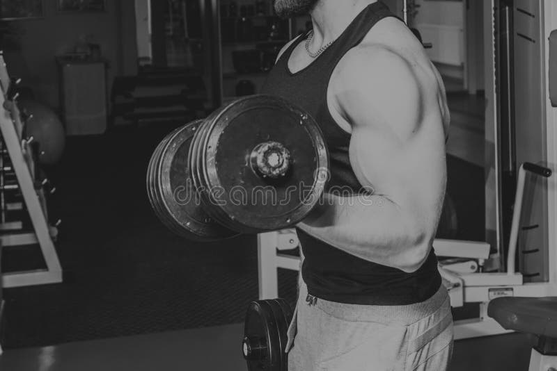 Professional Athlete Performs Exercises in the Gym Stock Photo - Image ...