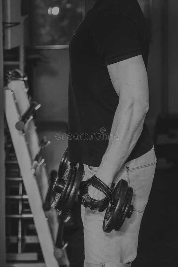 Professional Athlete Performs Exercises in the Gym Stock Photo - Image ...