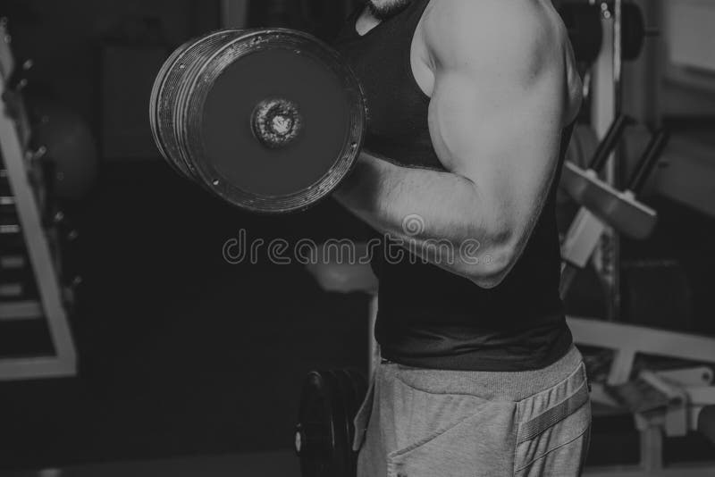 Professional Athlete Performs Exercises in the Gym Stock Photo - Image ...