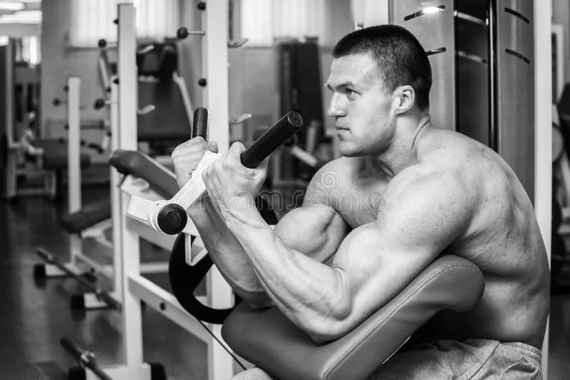 Professional Athlete Performs Exercises in the Gym Stock Photo - Image ...