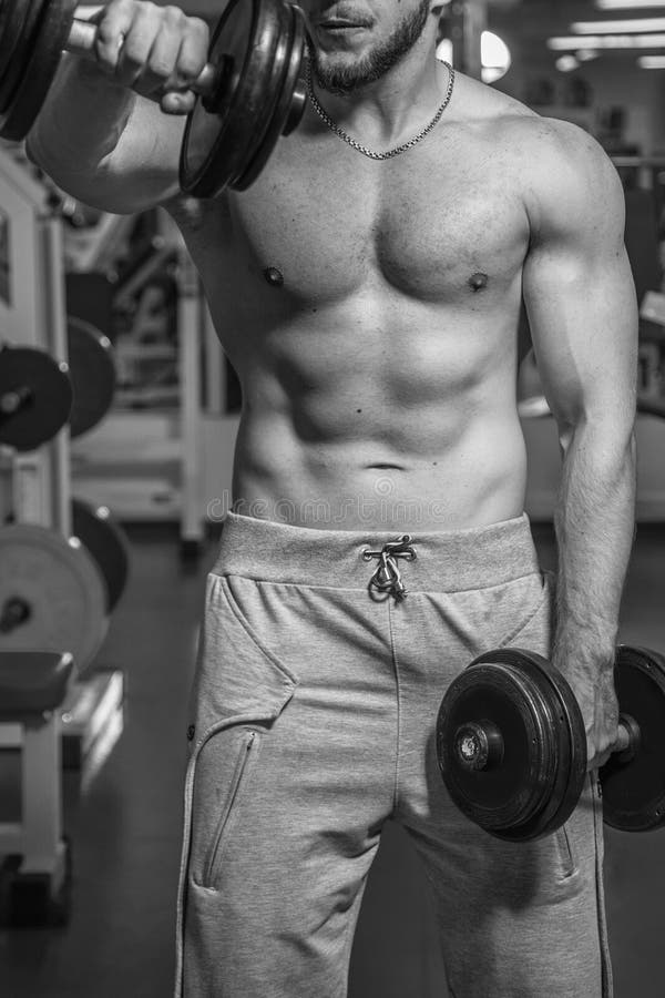 Professional Athlete Performs Exercises in the Gym Stock Photo - Image ...