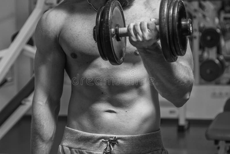 Professional Athlete Performs Exercises in the Gym Stock Photo - Image ...