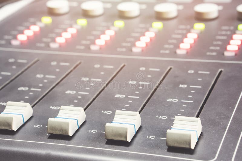 Professional Audio Mixing Console with Faders and Adjusting Knobs ...
