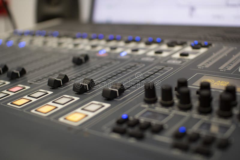 Professional Audio Mixing Console with Faders and Adjustment Knobs ...