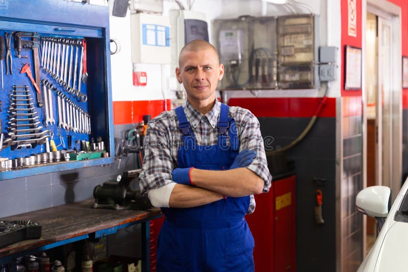 Professional Auto Mechanic Posing in Workshop Stock Image - Image of ...