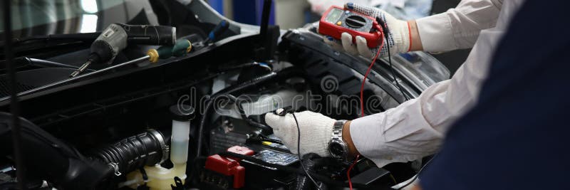 Professional Auto Mechanic Works in a Car Service and Tests Operation ...