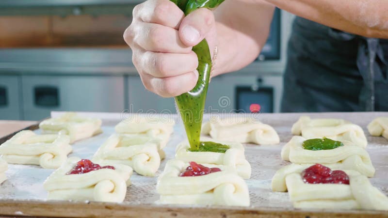 Professional Baker Adding Jam on Top of Sweet Baking before Put it into ...