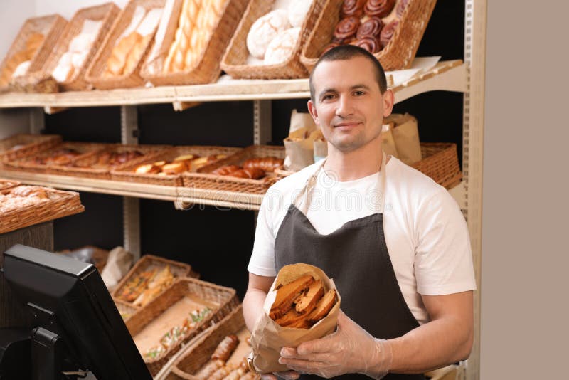 Professional Baker Holding Paper Bag with Pastry Stock Image - Image of ...