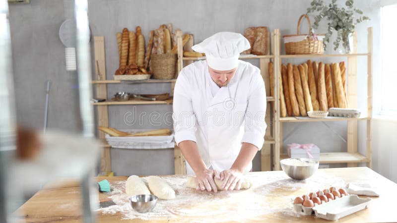 Professional Baker Prepares Raw Yeast Dough in a Bakery, Shaping it ...