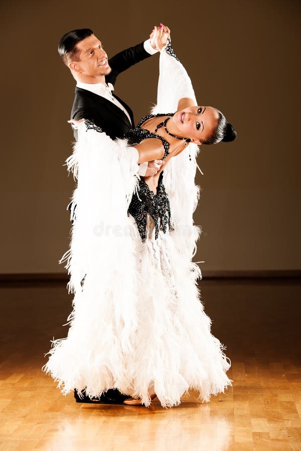 Professional Ballroom Dance Couple Preform an Exhibition Dance Stock ...