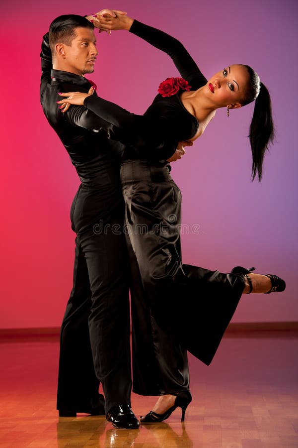 Professional Ballroom Dance Couple Preform an Exhibition Dance Stock ...