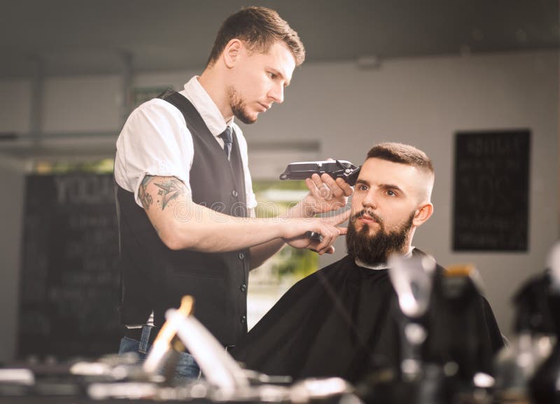 Professional Barber Doing a Haircut Stock Photo - Image of business ...