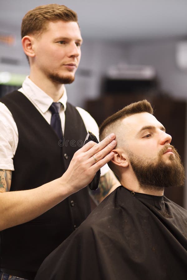 Professional Barber Doing a Haircut Stock Photo - Image of customer ...