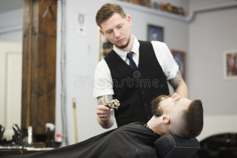 Professional Barber Doing a Haircut Stock Photo - Image of comb, beard ...