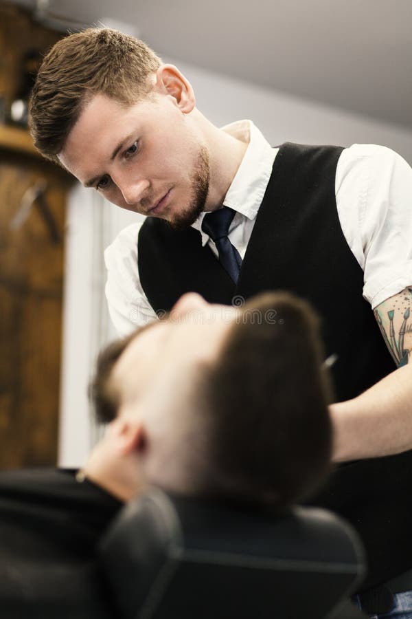 Professional Barber Doing a Haircut Stock Image - Image of business ...