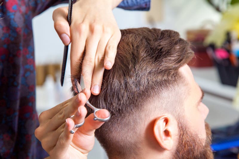 Professional Barber Styling Hair of His Client Stock Image - Image of ...