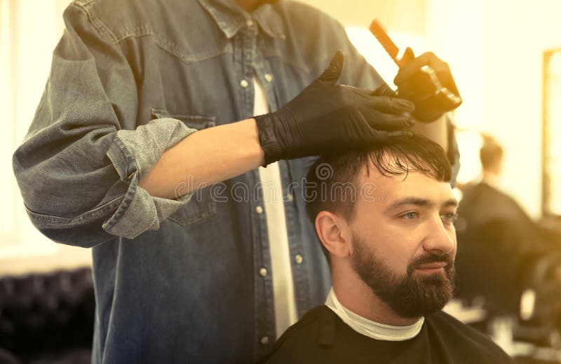 Professional Barber Working with Client in Hairdressing Salon Stock ...
