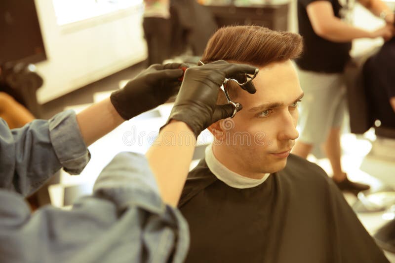 Professional Barber Working with Client in Hairdressing Salon Stock ...