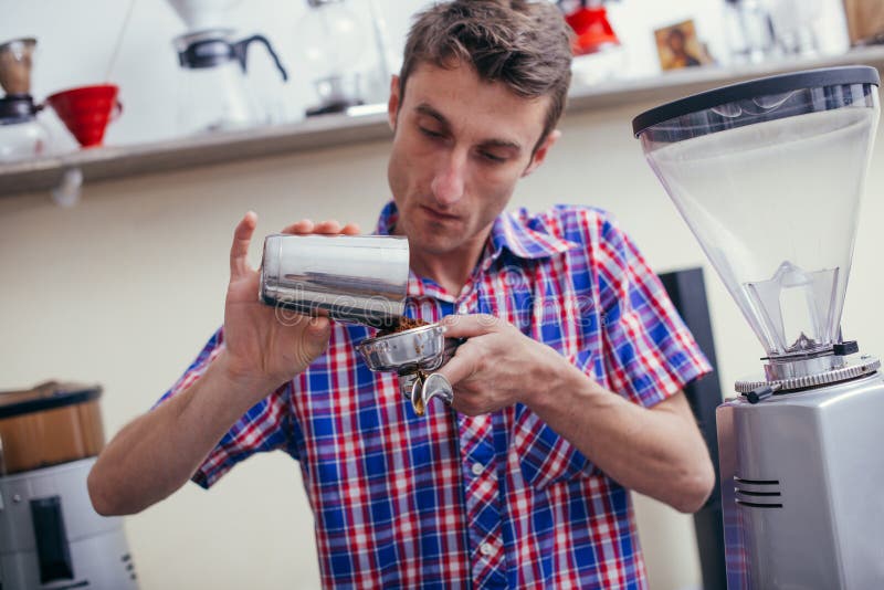 Professional Barista in a Modern Roastery Preparing for a Coffee Stock ...