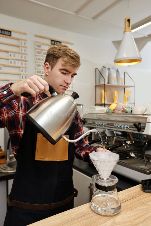 Professional Barista Man Making Coffee at the Coffee Shop. Stock Image ...